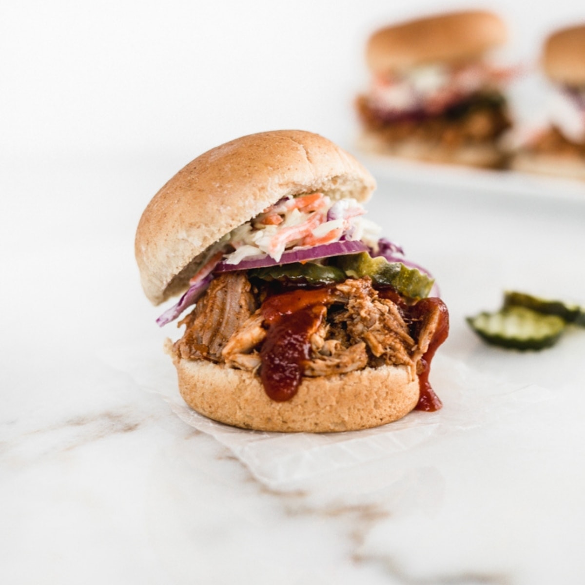 Easy Slow Cooker BBQ Pulled Pork Sliders - Lively Table